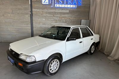 Used Mazda 323 130 Midge Sedan for sale in Free State - Cars.co.za (ID ...