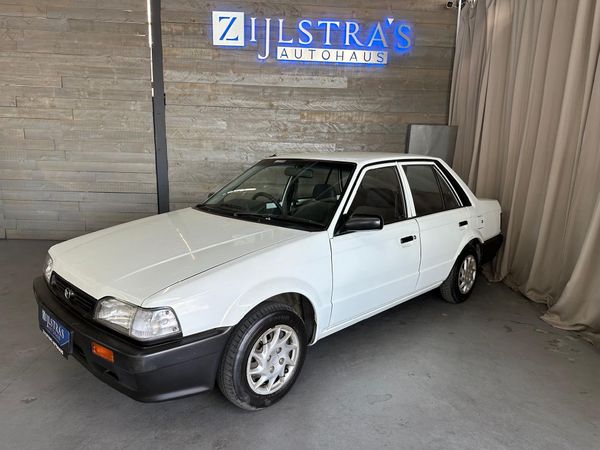 Used Mazda 323 130 Midge Sedan for sale in Free State - Cars.co.za (ID ...