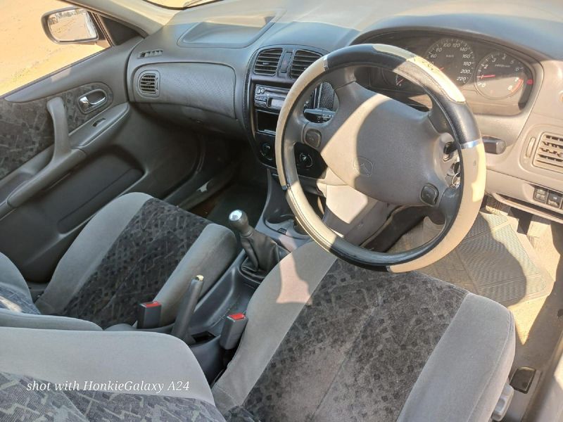 Used Mazda Etude 160 Sedan for sale in North West Province - Cars.co.za ...